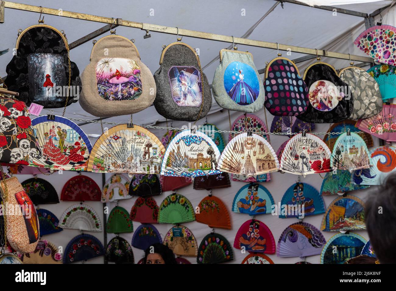 A market stall at the Rastro flea market in Madrid with typical Spanish ...