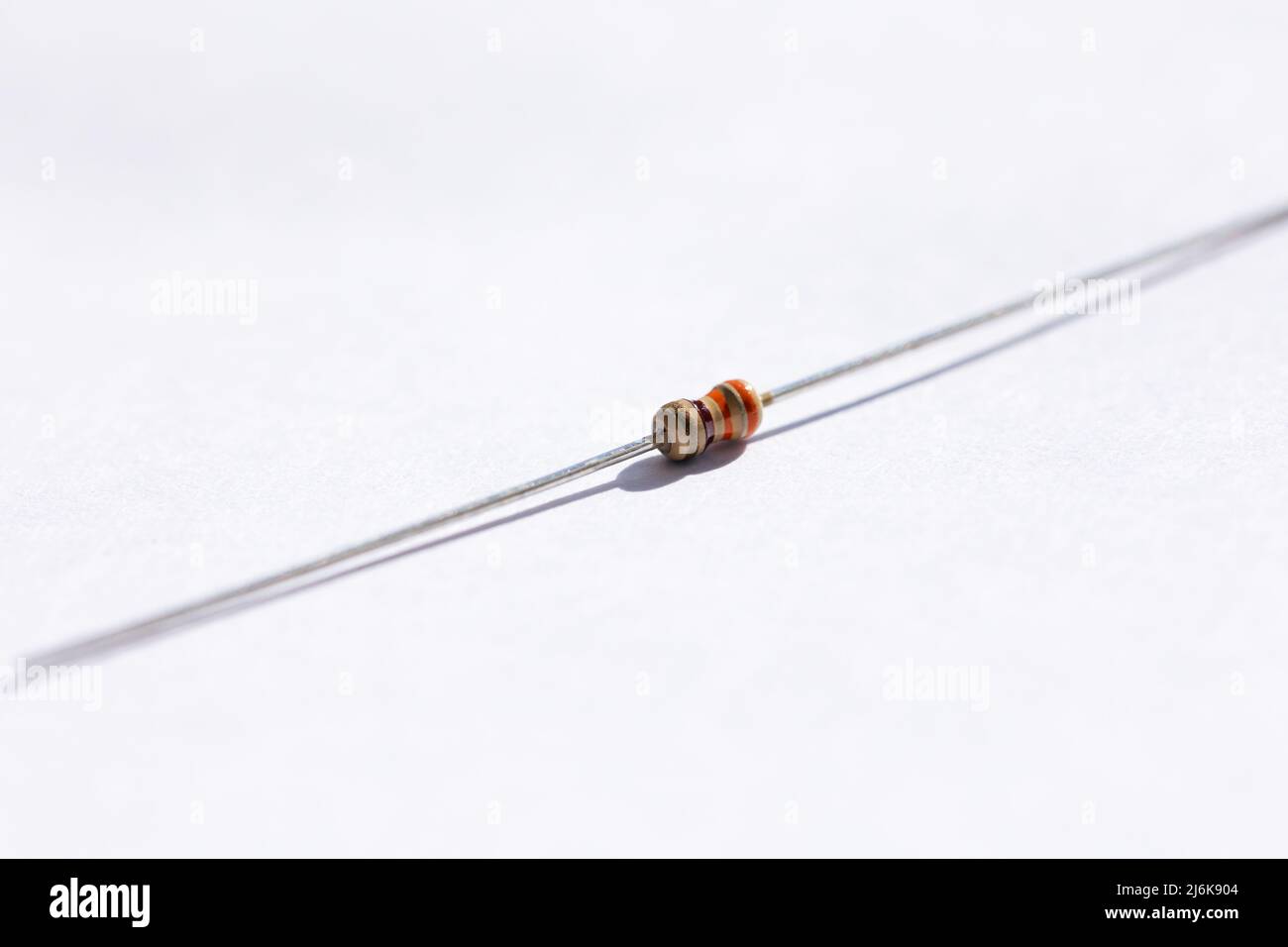 A close up portrait of a 330 ohm resistor with a 5% tolerance. The ...