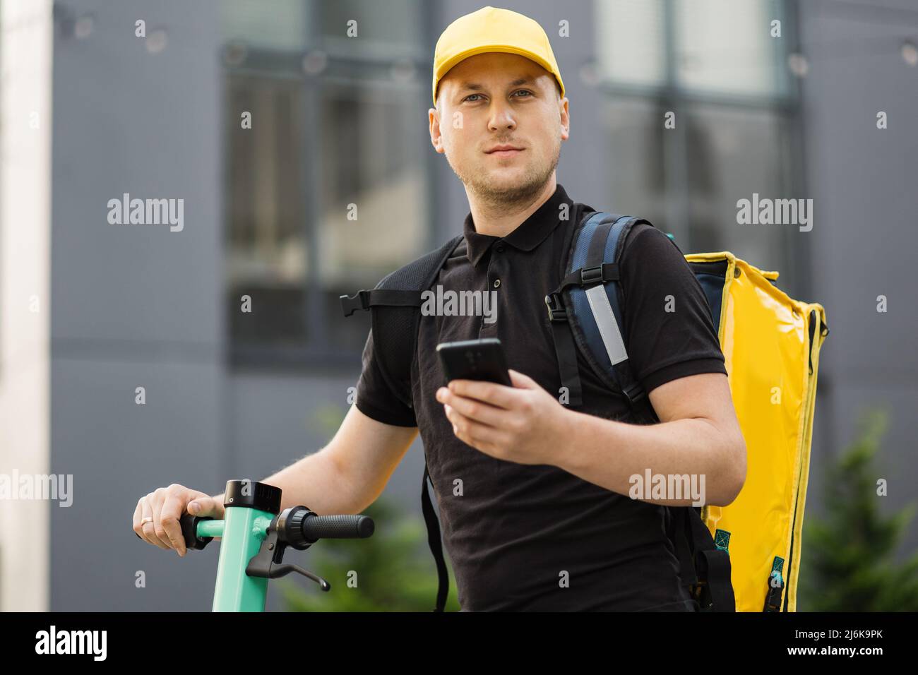 Deliveryman worker employee deliver online order client customer. Male ...