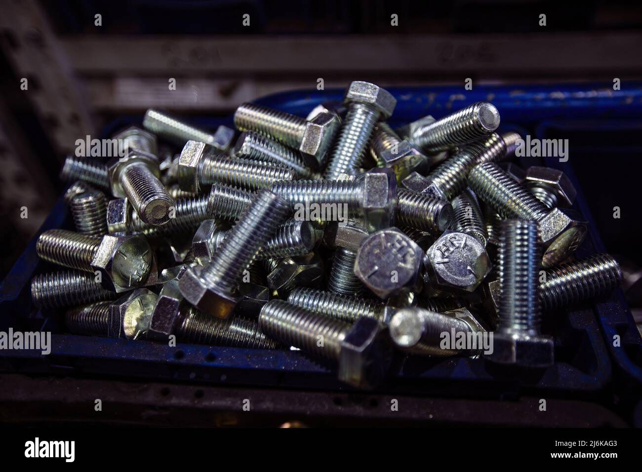 Bolts in the rack, close up view Stock Photo - Alamy
