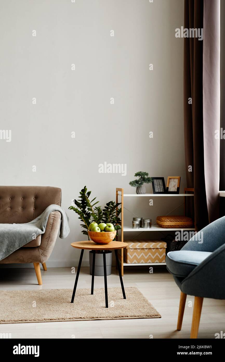 Vertical background image of minimal living room interior with cozy ...