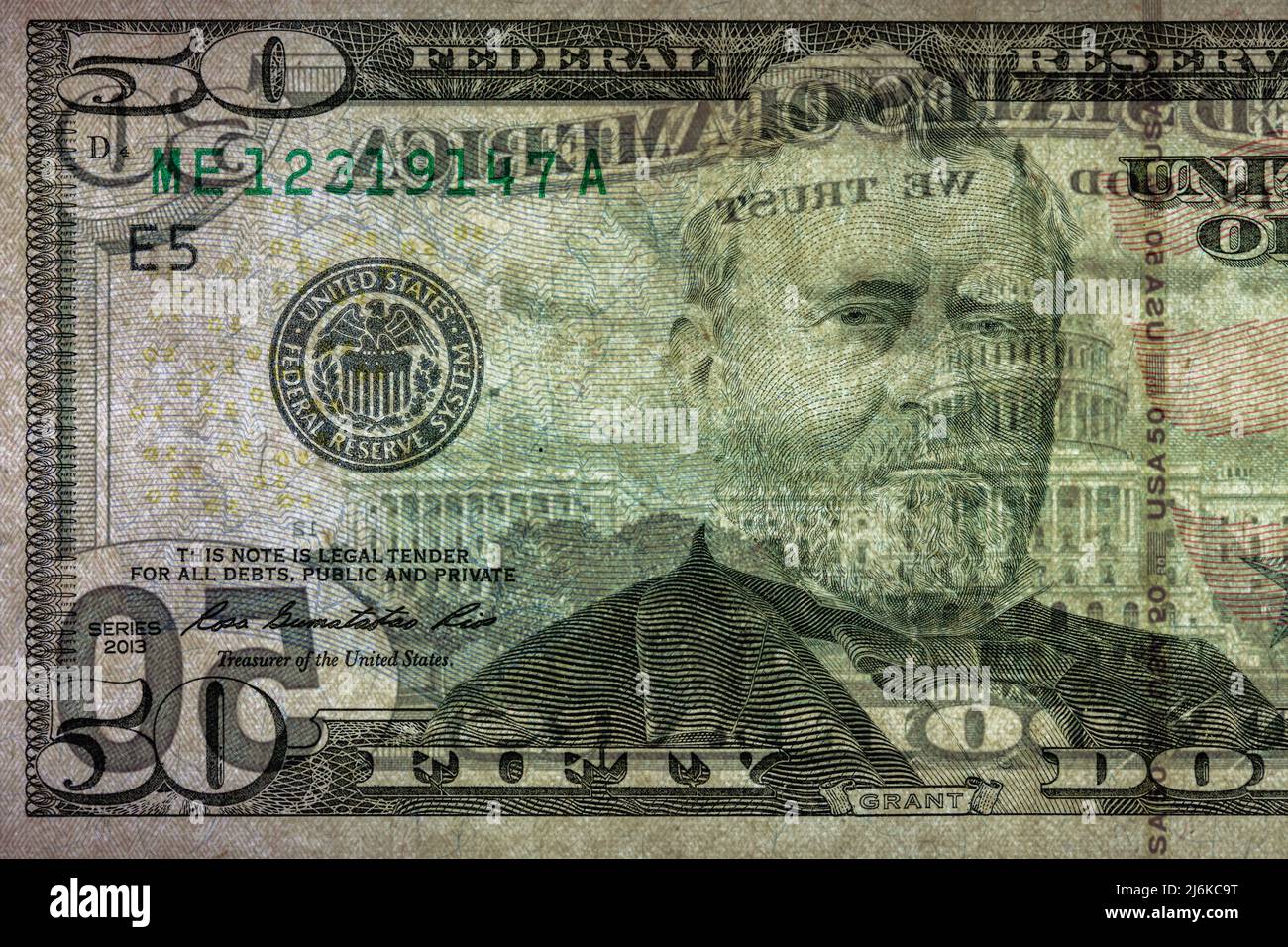 fragment of 50 dollar banknote with visible details of banknote reverse ...