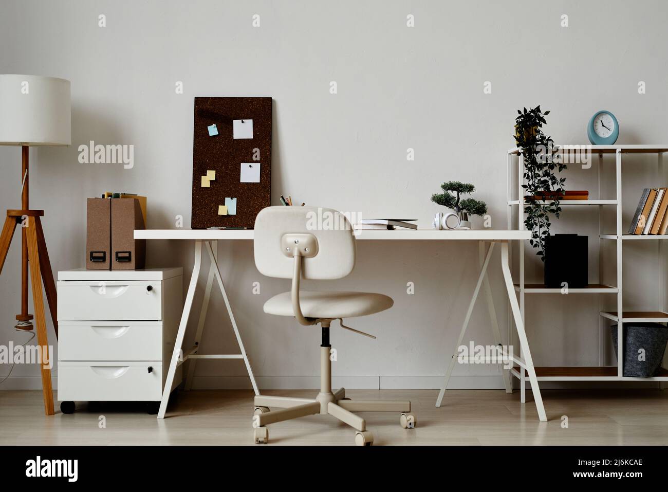 Background of simple home office workplace in white with bonsai tree on ...