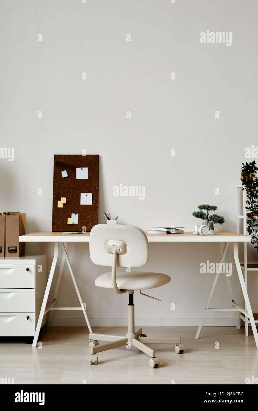 Vertical background of simple home office workplace in white with ...