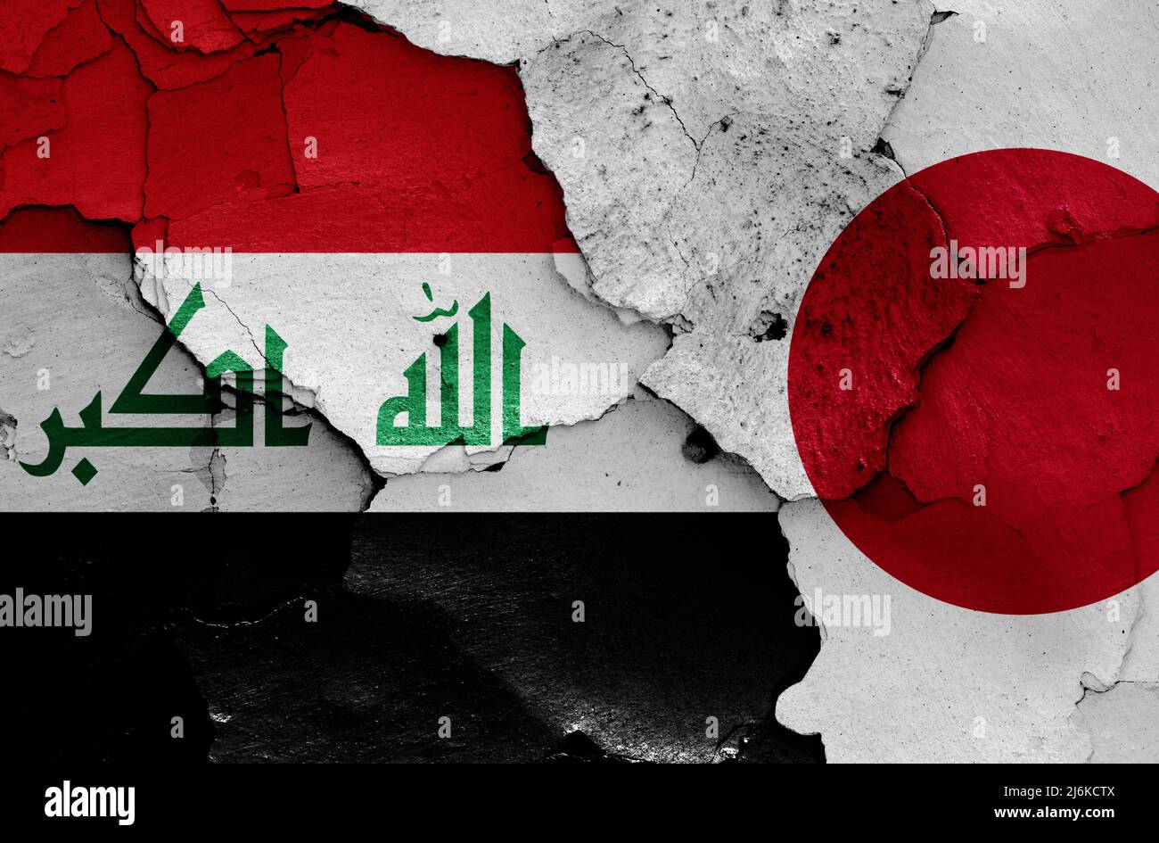 flags of Iraq and Japan painted on cracked wall Stock Photo - Alamy
