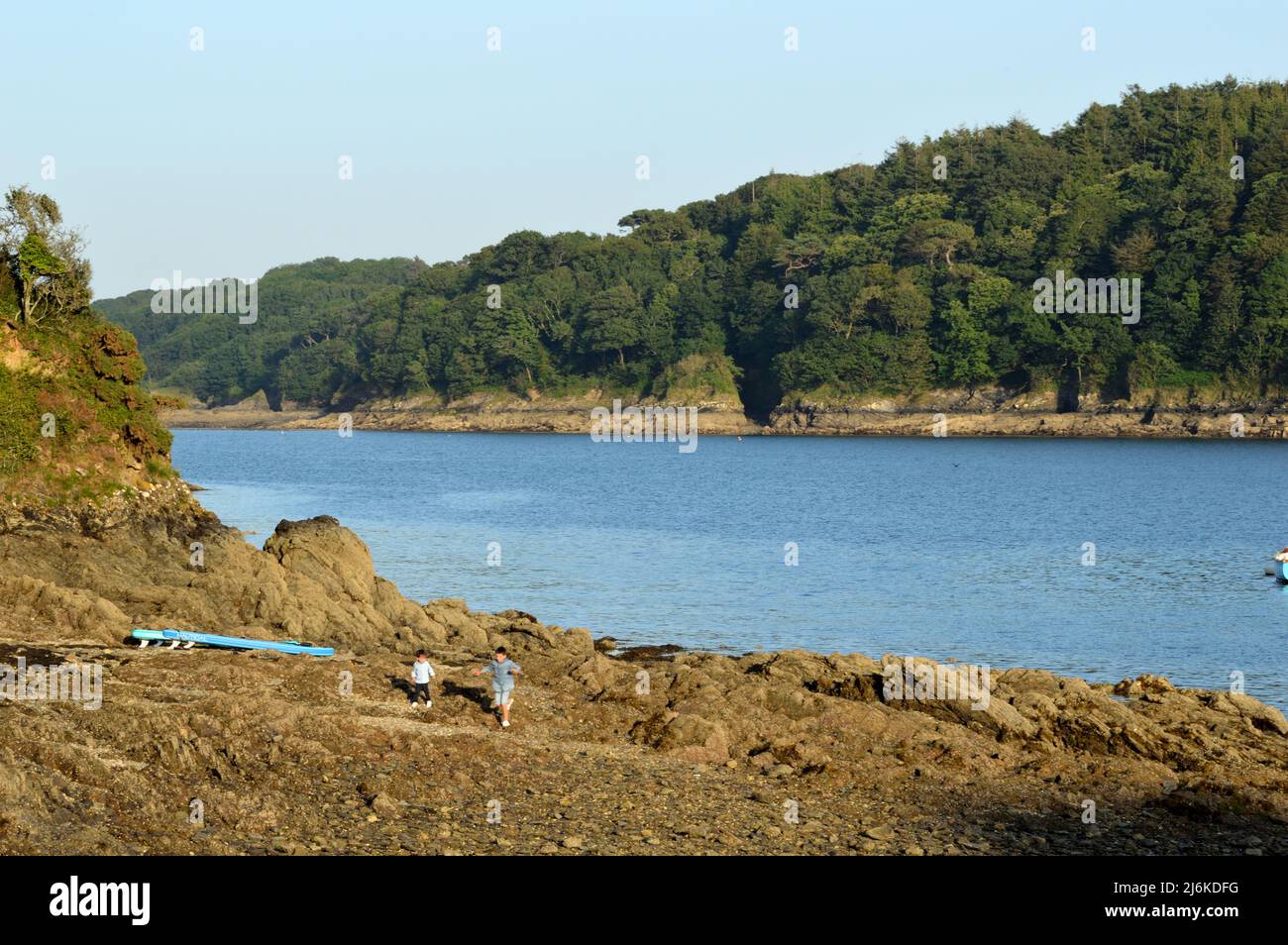 Helford River, Cornwall - 19 July 202: little boys adventuring over the ...