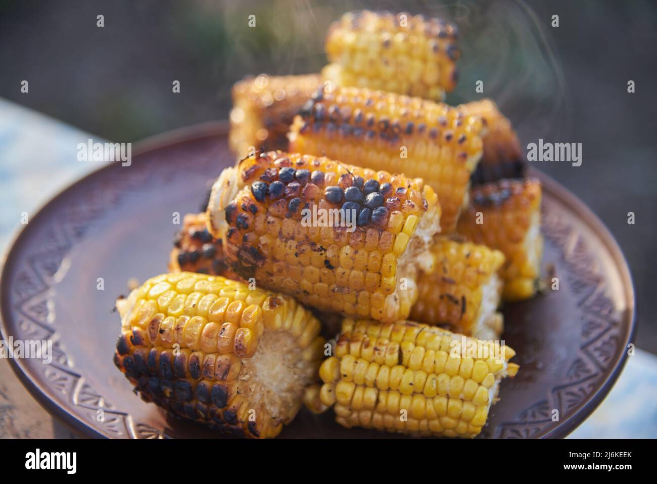 Fresh baked corn cobs hi-res stock photography and images - Alamy