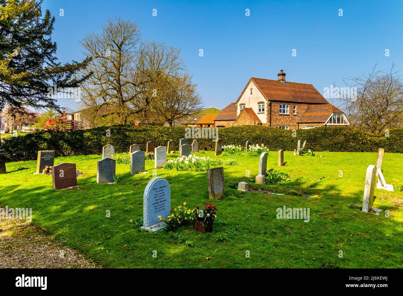 Village church and cemetery hi-res stock photography and images - Alamy