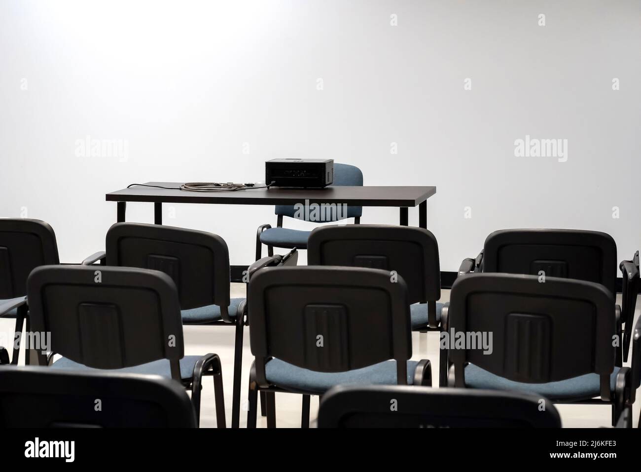 Simple empty prepared lecture hall, conference room chairs and ...