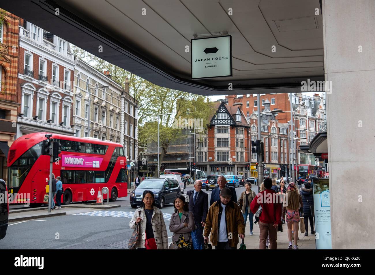London, April 2022: Busy street scene with shoppers walking on ...
