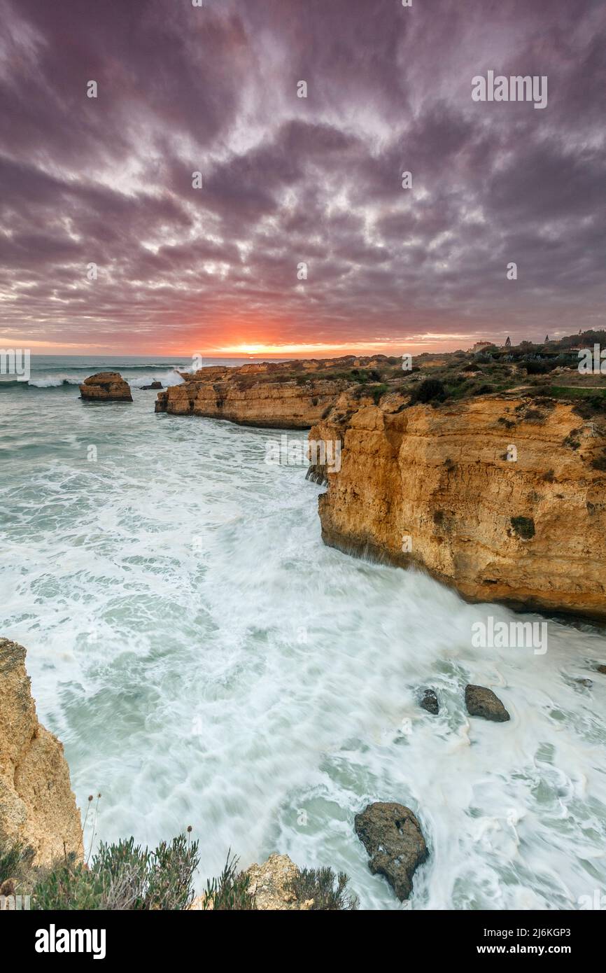Sunset at Pirates beach, Albufeira, Algarve coast, Portugal Stock Photo ...