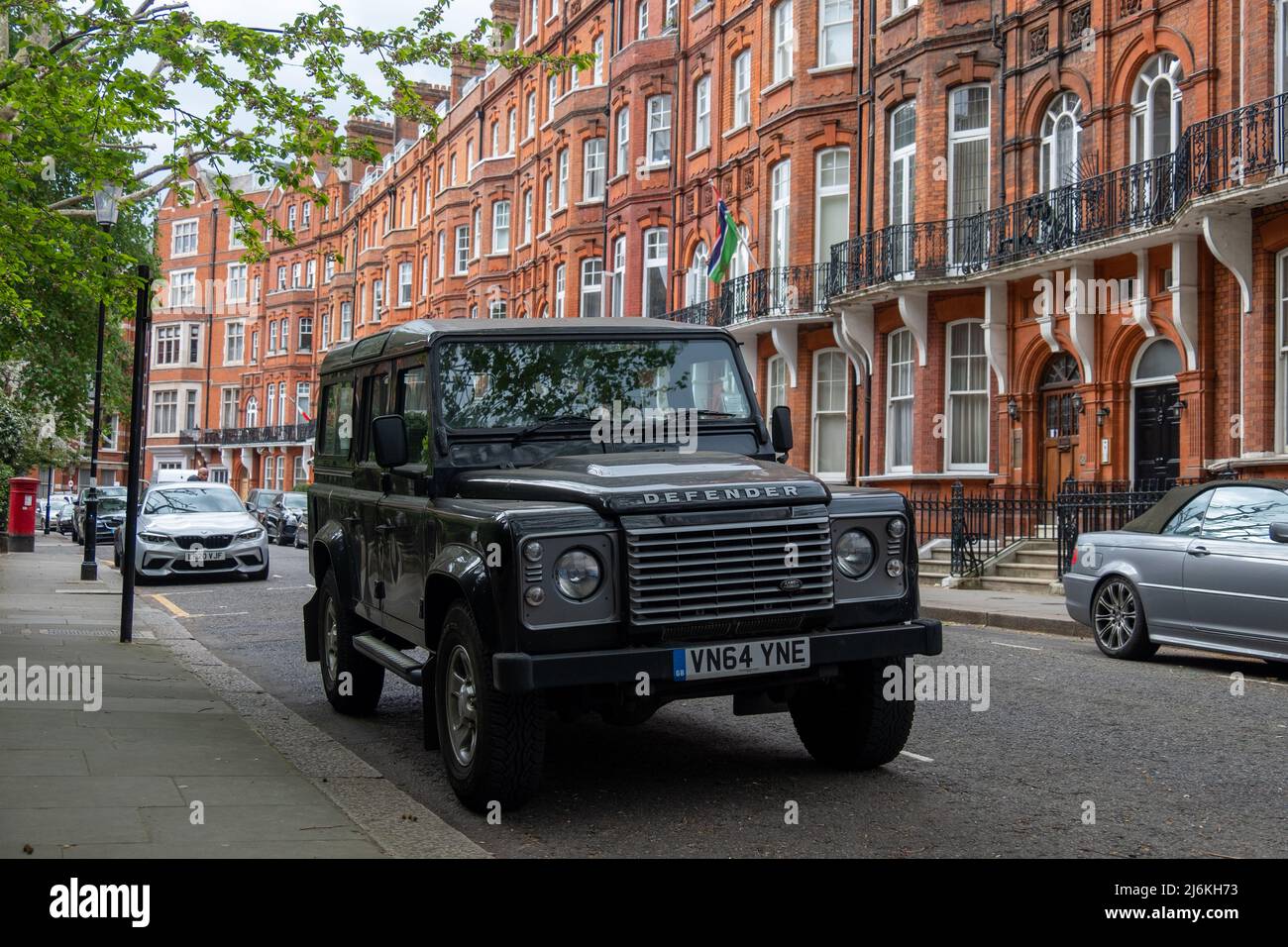 LONDON- April 2022: Land Rover Defender parked on London city street ...