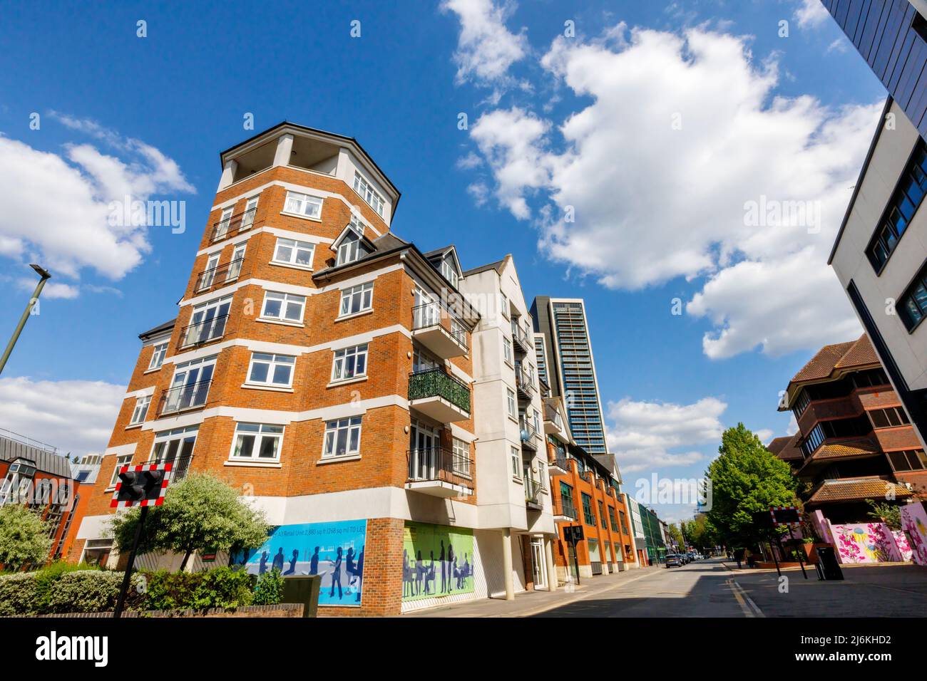 View along Goldsworth Road towards the town centre with the towers of ...