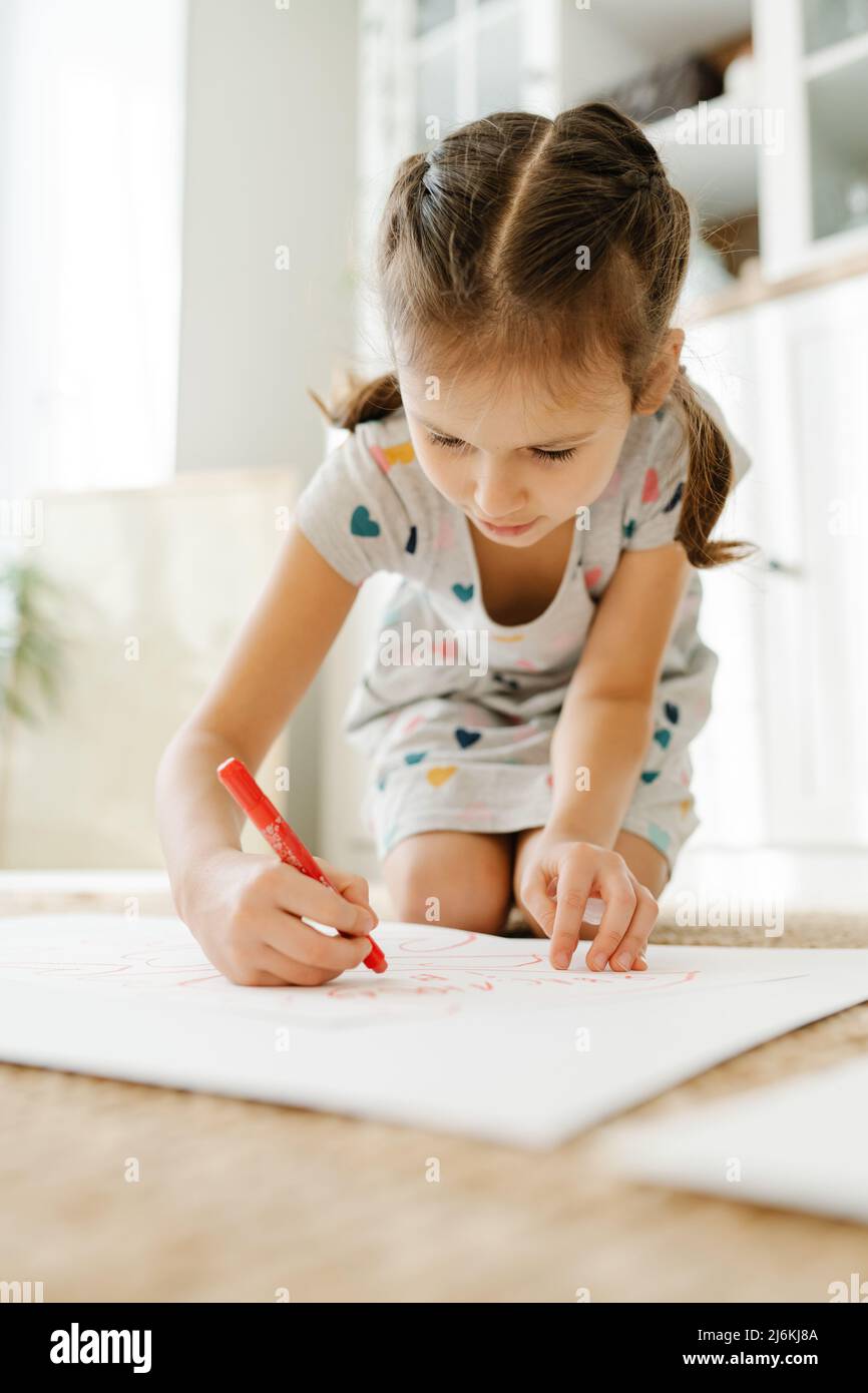 Child drawing a lot of hearts Stock Photo - Alamy