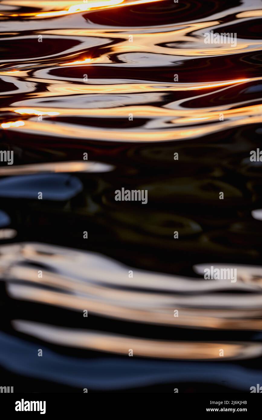 sun ray relection on water surface Stock Photo - Alamy