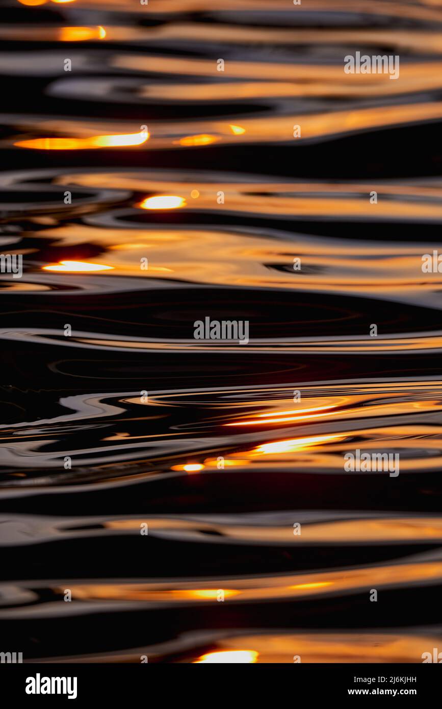 sun ray relection on water surface Stock Photo - Alamy