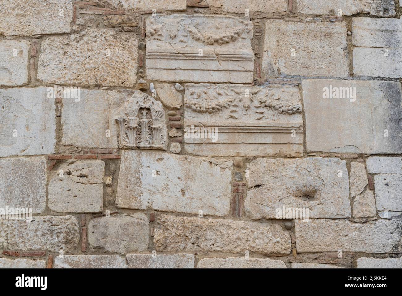 old wall of old Romanesque blocks as a background, Benevento, Campania ...
