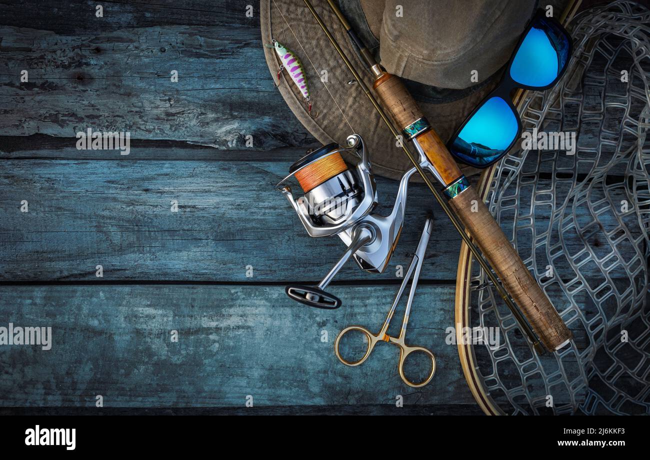 Fishing tackle background. Trout stream fishing Stock Photo - Alamy