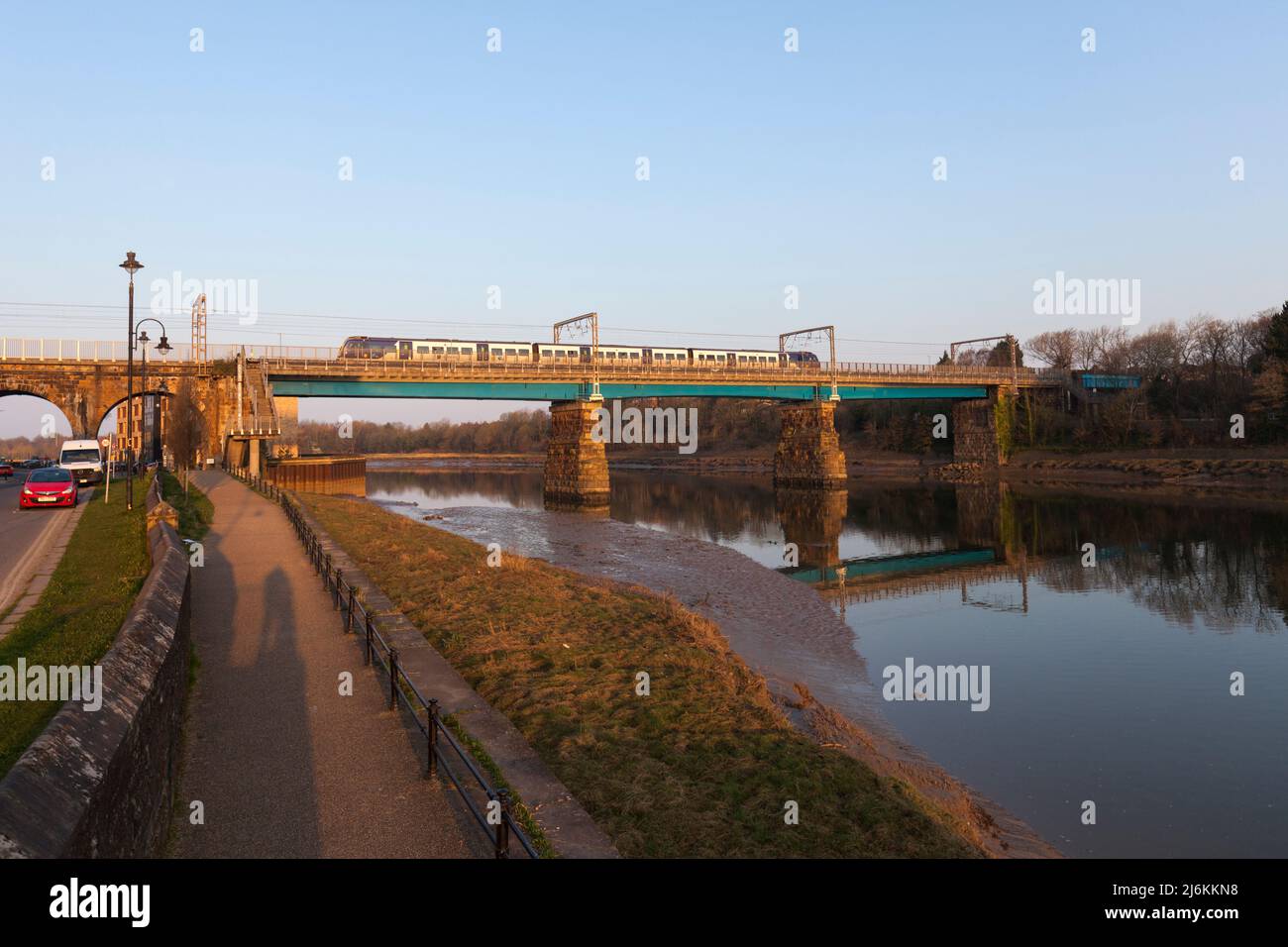 Northern rail class 195 diesel train 195118 crossing Carlisle bridge ...