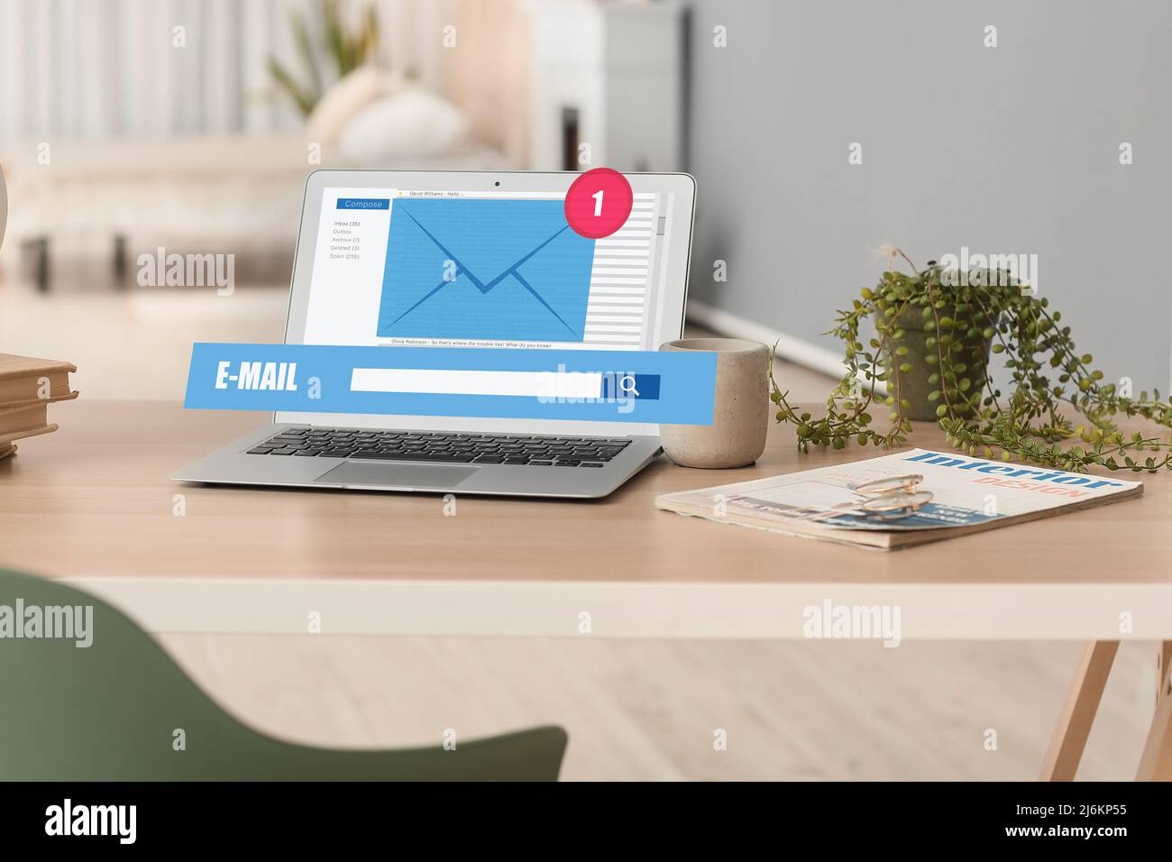 Modern laptop with symbols of new unread message and search bar on ...