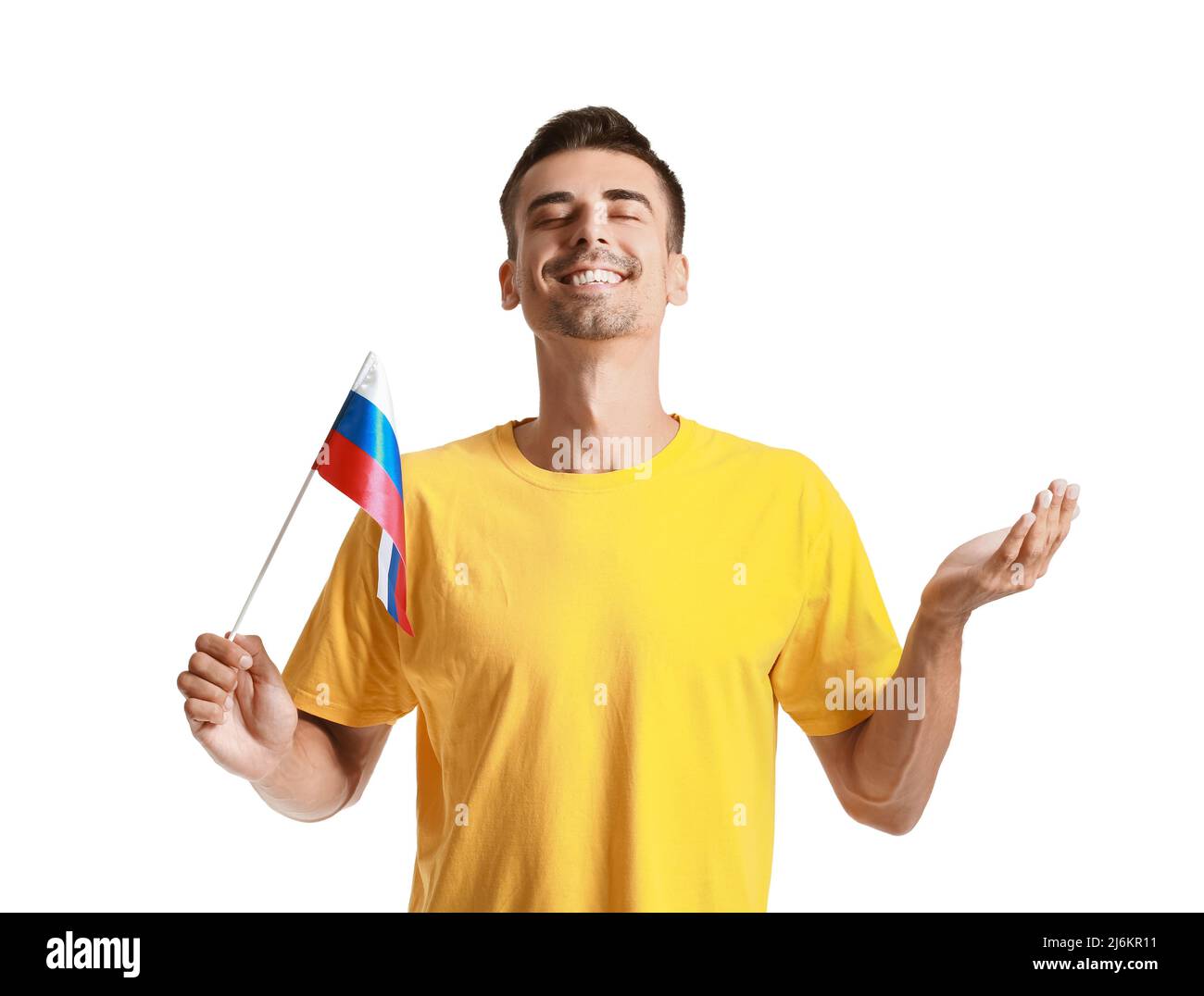 Happy young man with national flag of Russia on white background Stock ...