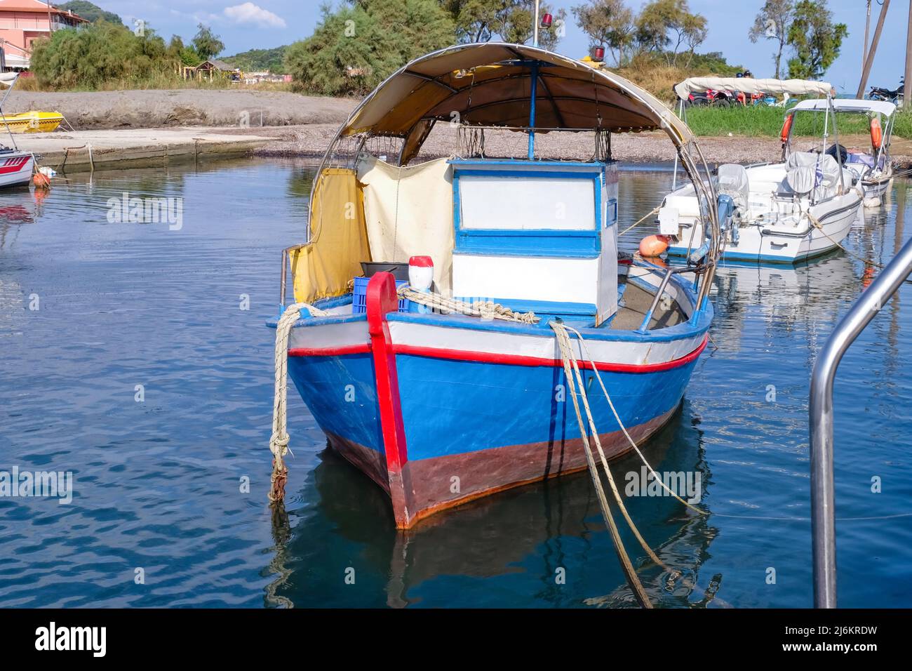 Old fishing boat berthed at sea resort Stock Photo - Alamy