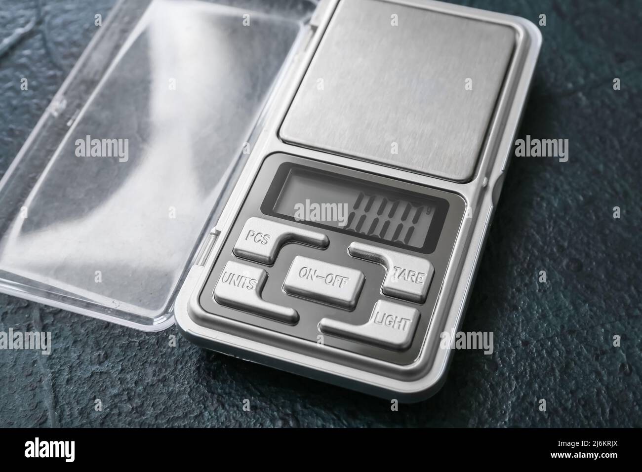 Weighing scales on dark hi-res stock photography and images - Alamy