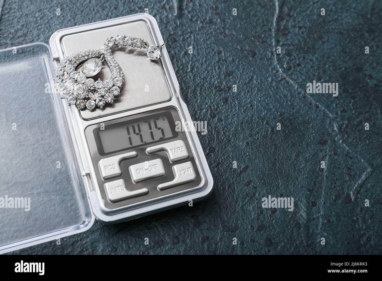 Weighing scales on dark hi-res stock photography and images - Alamy