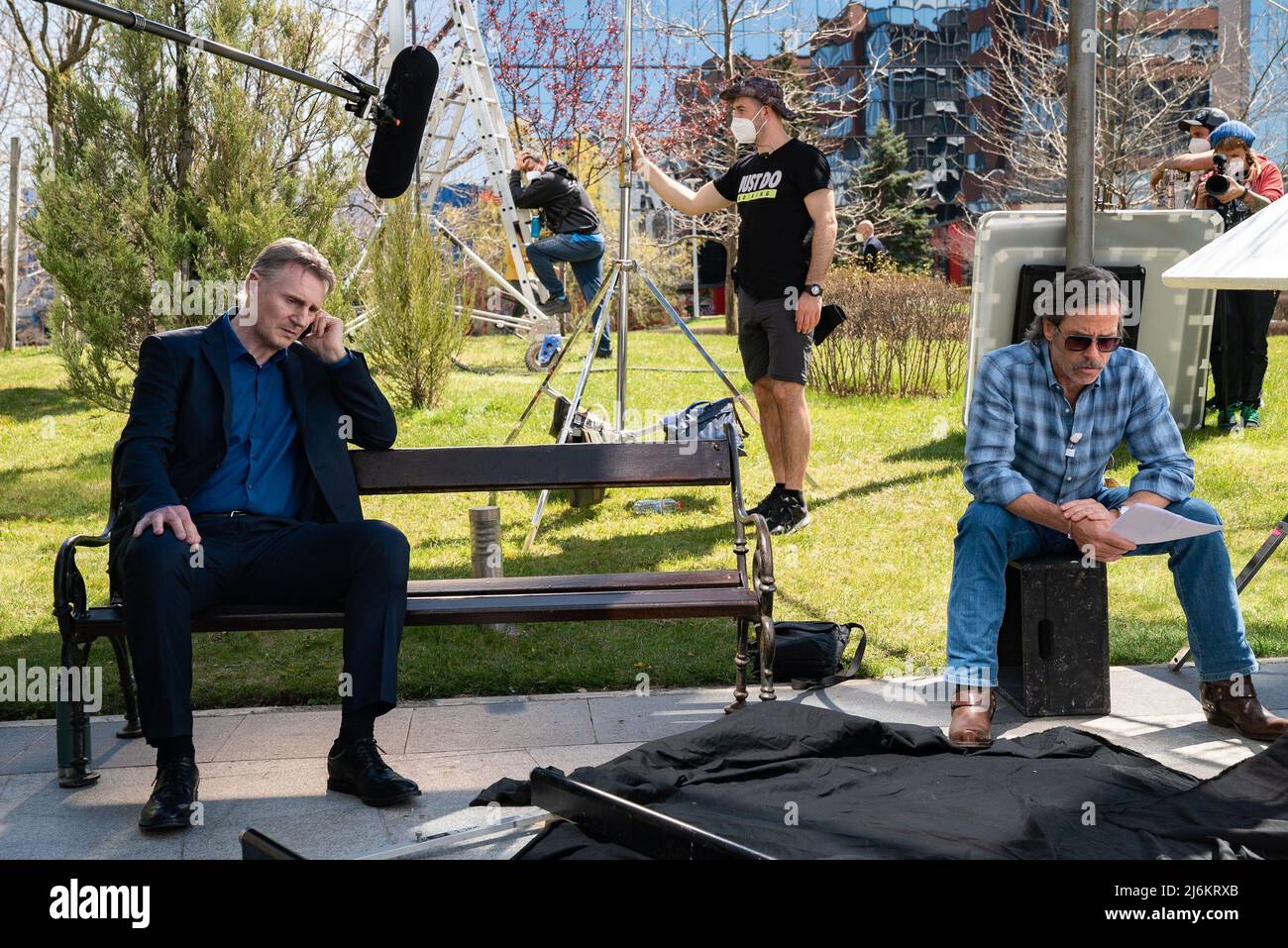 MEMORY, front, from left: Liam Neeson, Guy Pearce, on set, 2022. ph ...