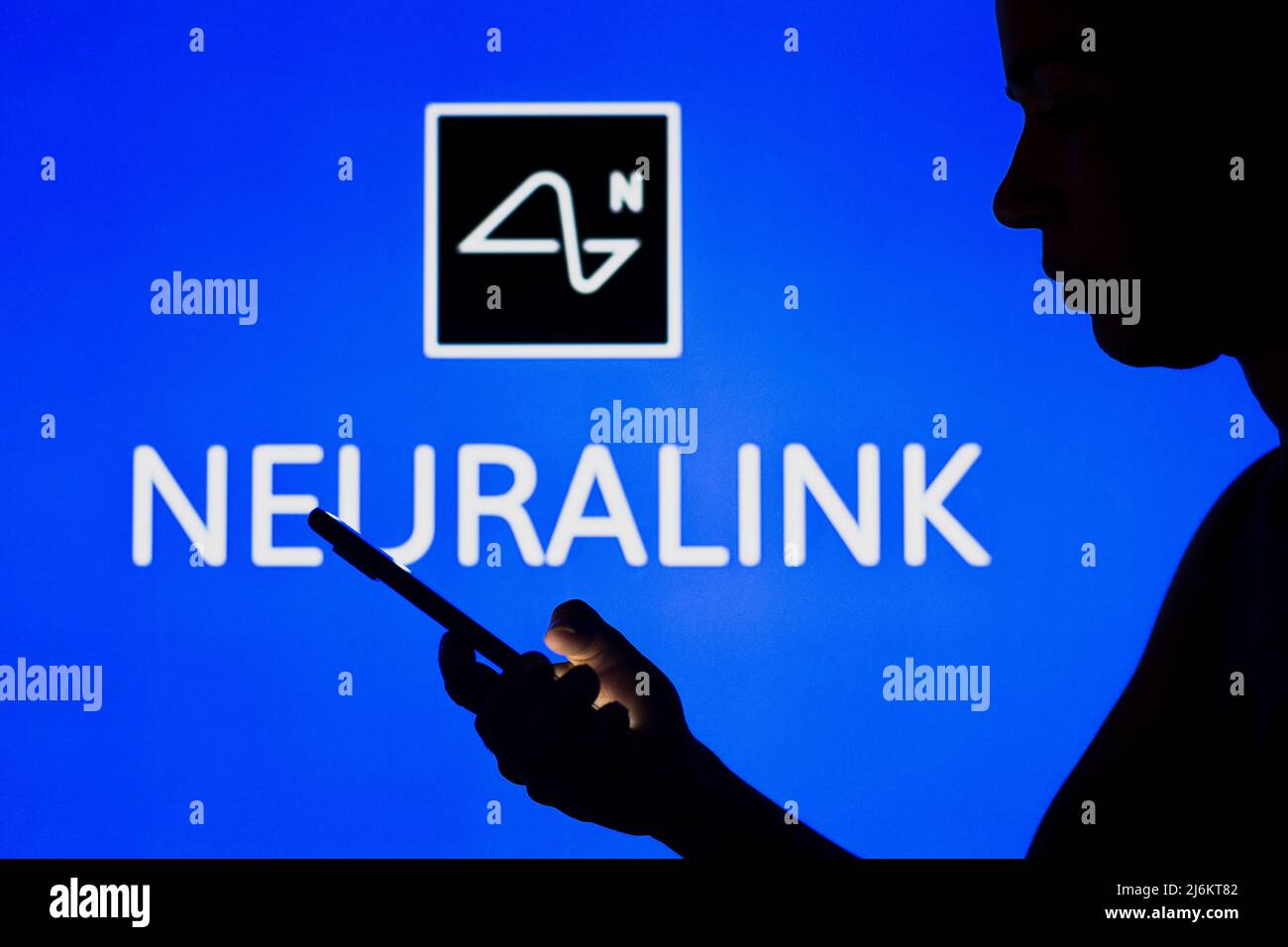 In this photo illustration, the Neuralink logo is seen in the ...