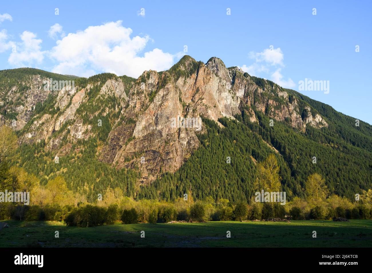 Mount Si rising above the farmalnd in North Bend Washington with the ...