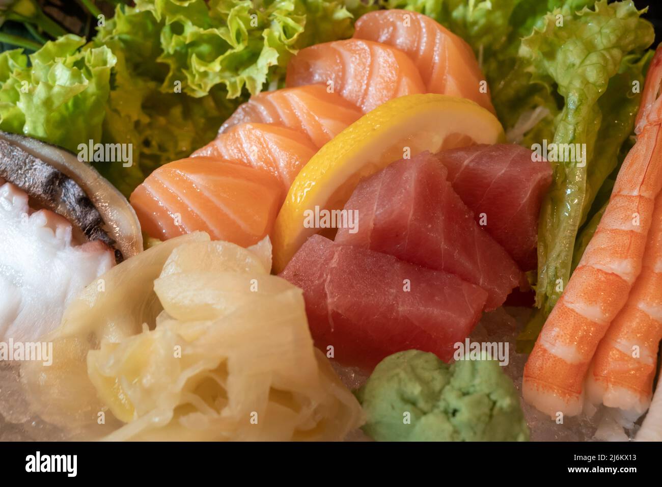 Top and close up view of mix sashimi plate, sliced of salmon, tuna ...