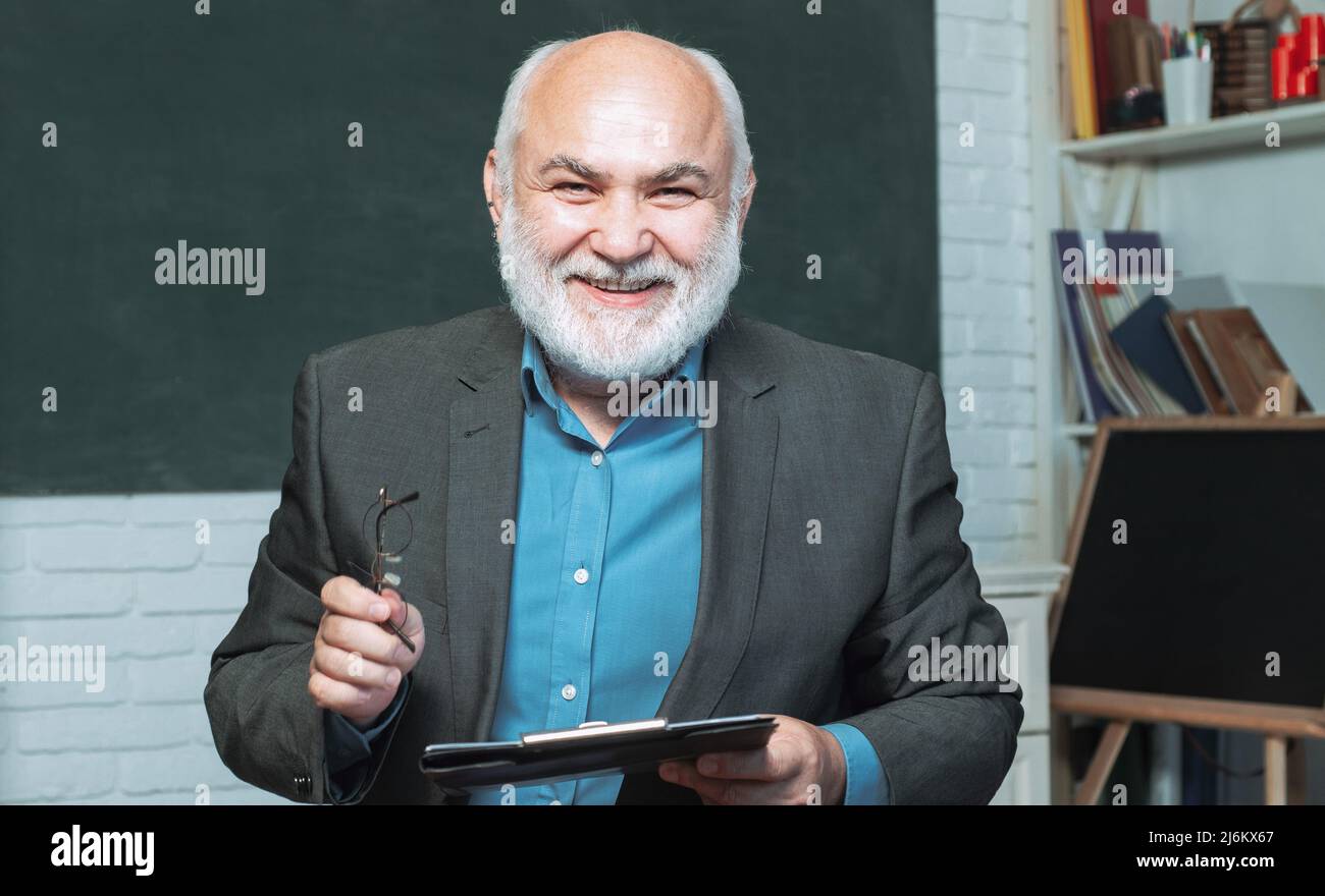 Teachers day - knowledge and educational school concept. Bearded ...