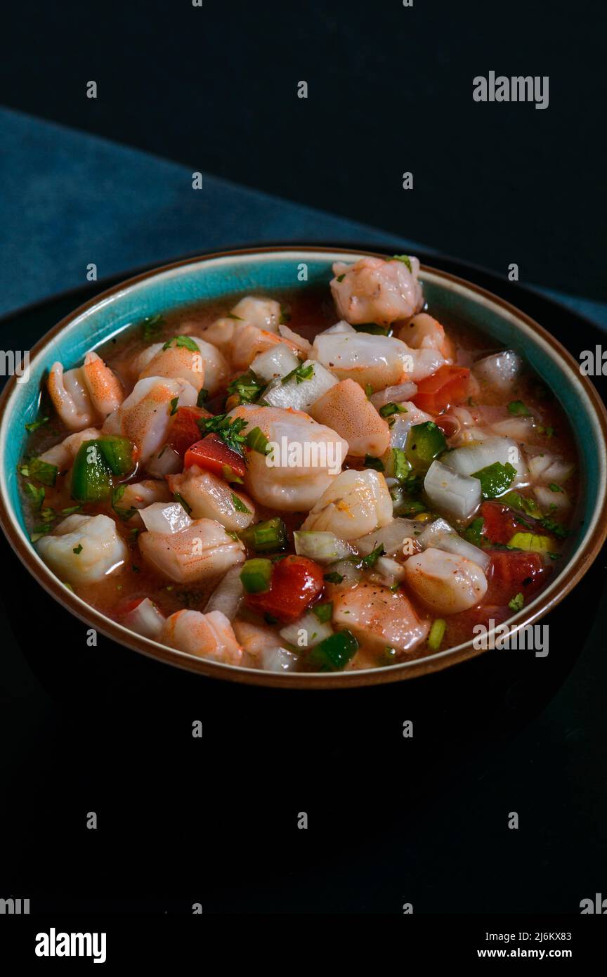 Red Shrimp Ceviche, Mexican food, low key Stock Photo - Alamy