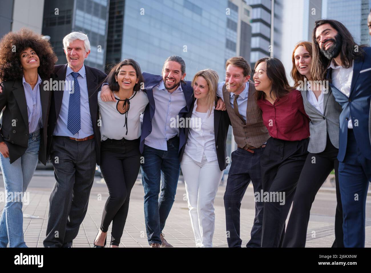 Business team taking a group photo in financial district Stock Photo ...