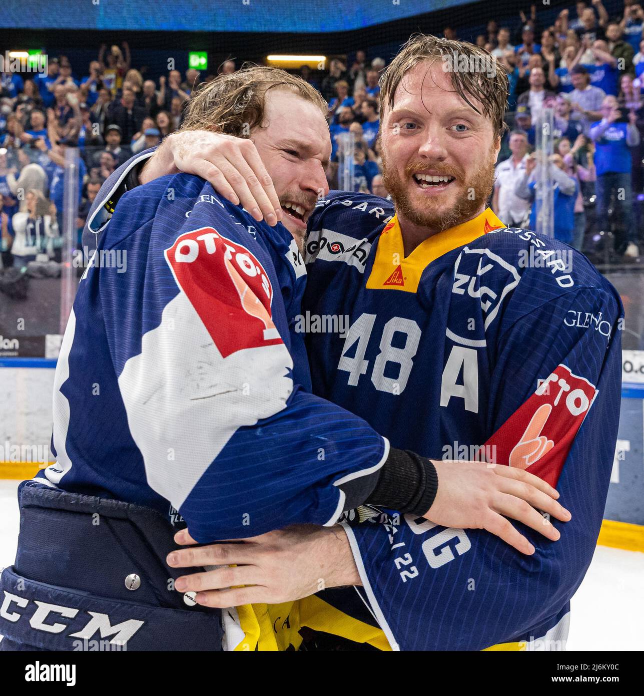 Sven Senteler #88 (EV Zug) and Carl Klingberg #48 (EV Zug) during the ...