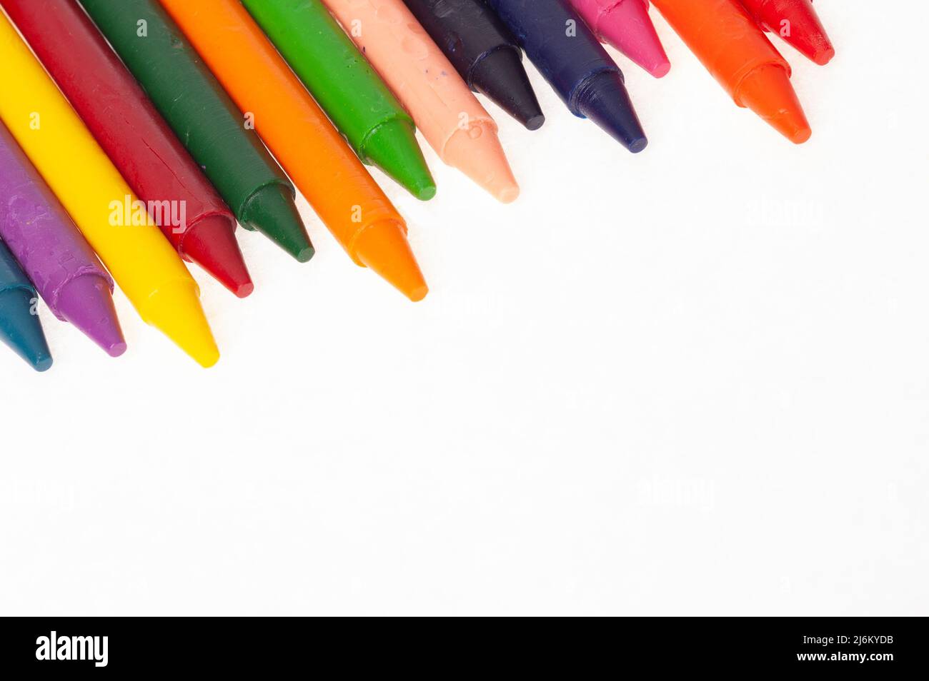 Multi colored crayons, unwrapped, no wrappers, isolated on white with ...