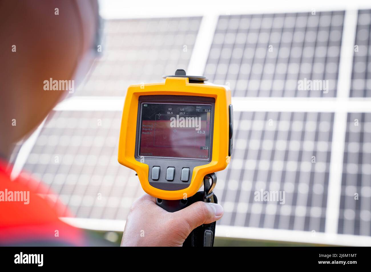 The technician takes the Thermoscan(thermal image camera) scan to the ...