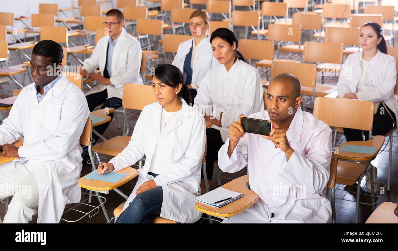 Female speaker medical conference hi-res stock photography and images ...