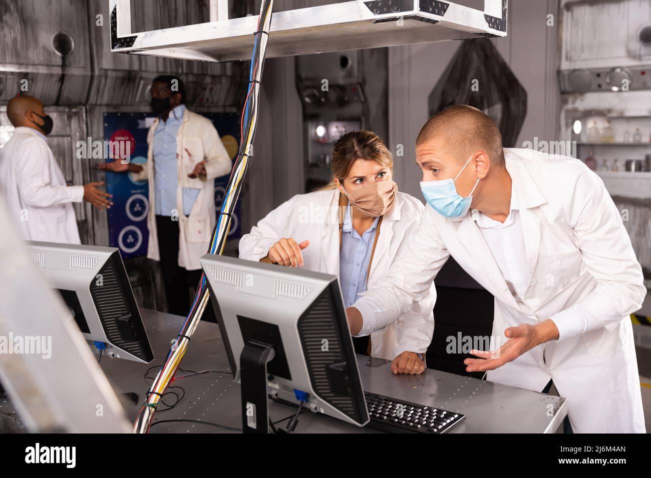 Four friends in quest room during coronavirus pneumonia outbreak Stock ...