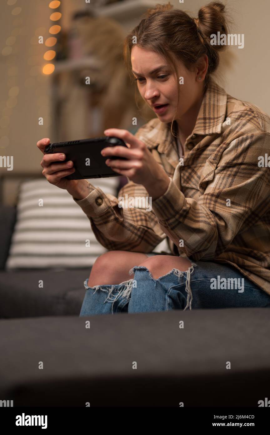 Excited pretty gamer girl in hi-res stock photography and images - Alamy