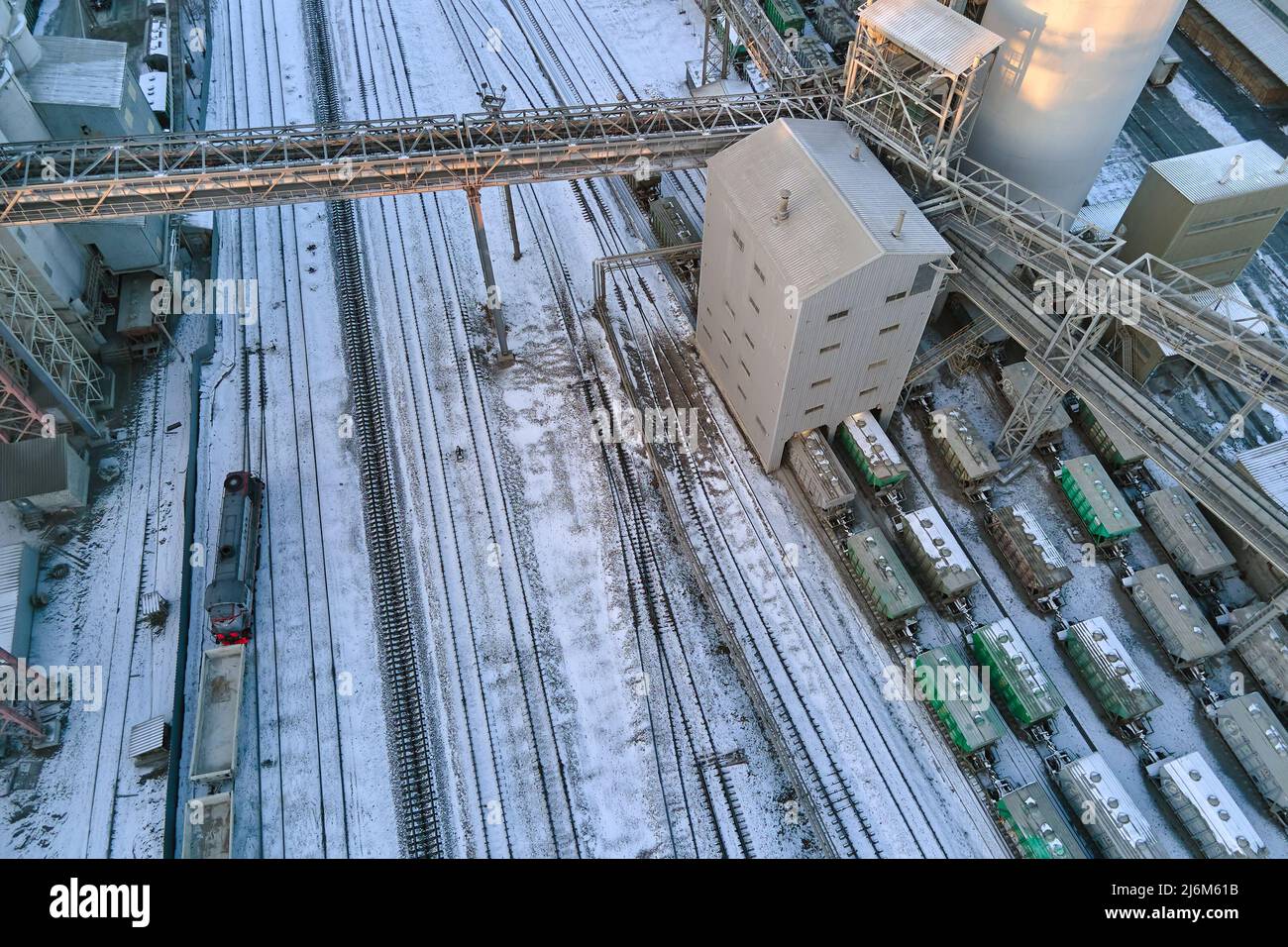 Aerial view of cargo train cars loaded with construction goods at ...