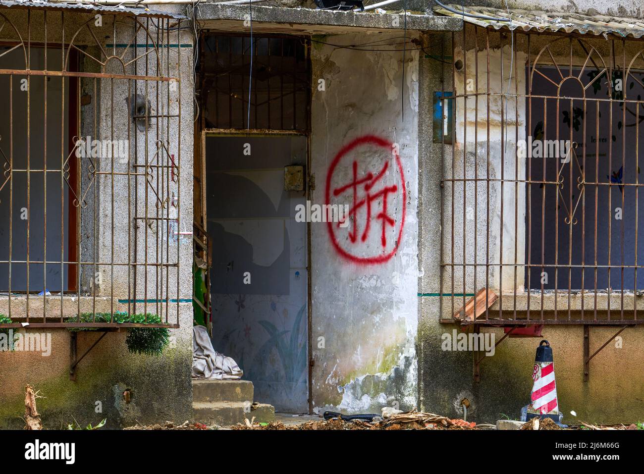 Demolition words are written on the abandoned old residential buildings ...