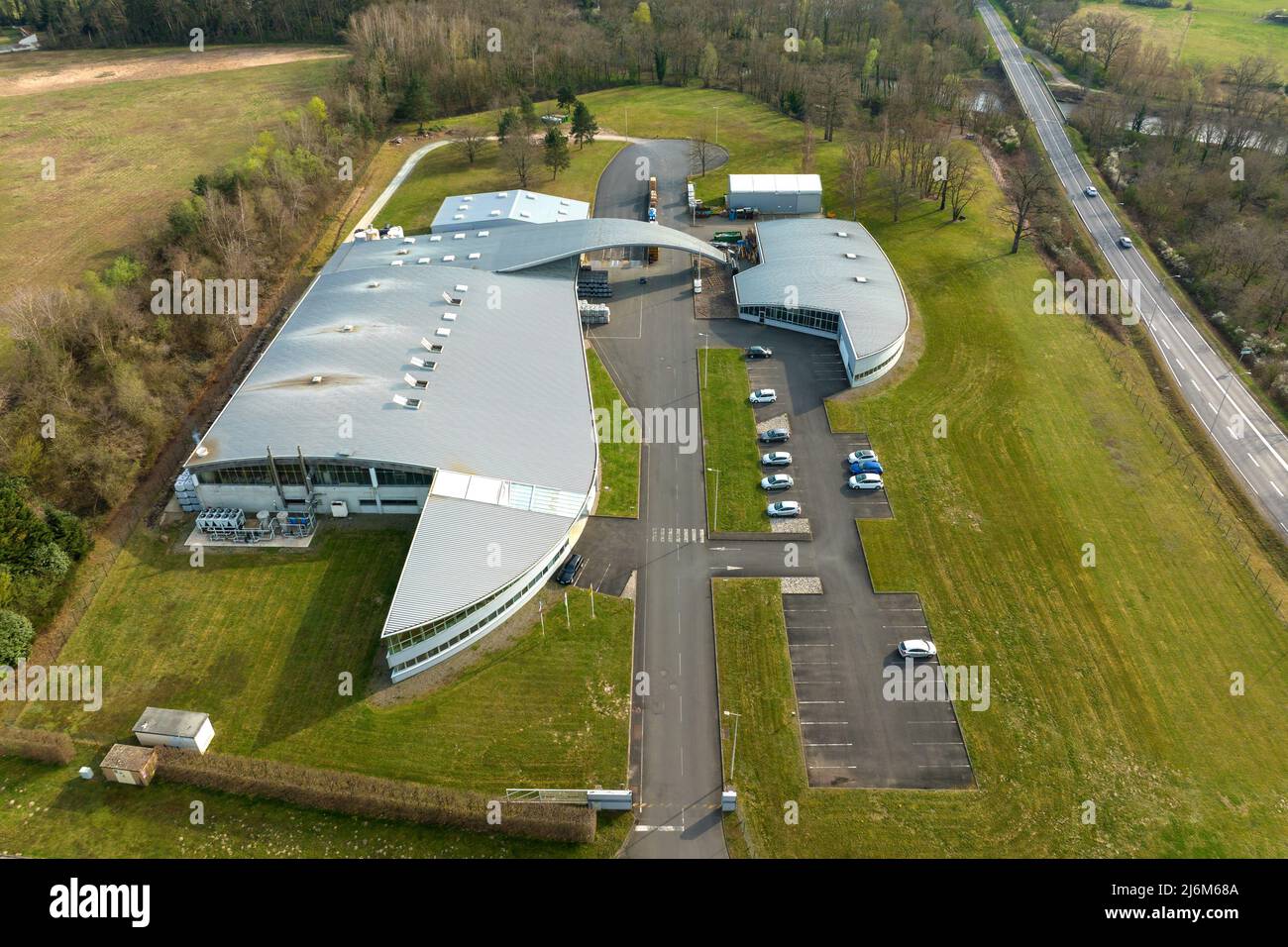 Aerial view of modern factory structure for production and distribution ...