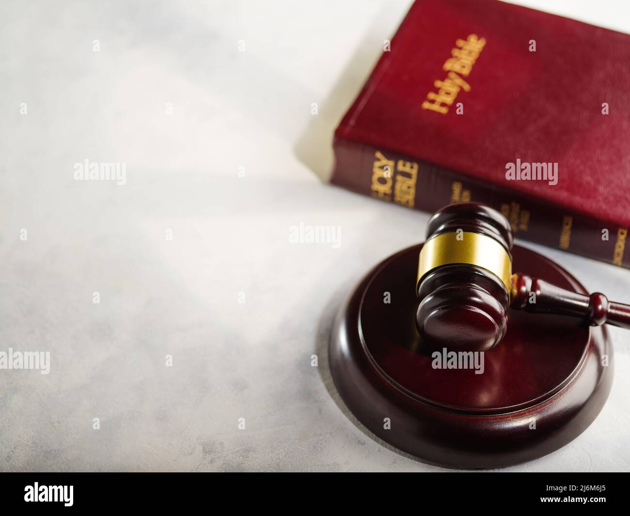 Holy bible book and judge's gavel on white background. Judicial system ...
