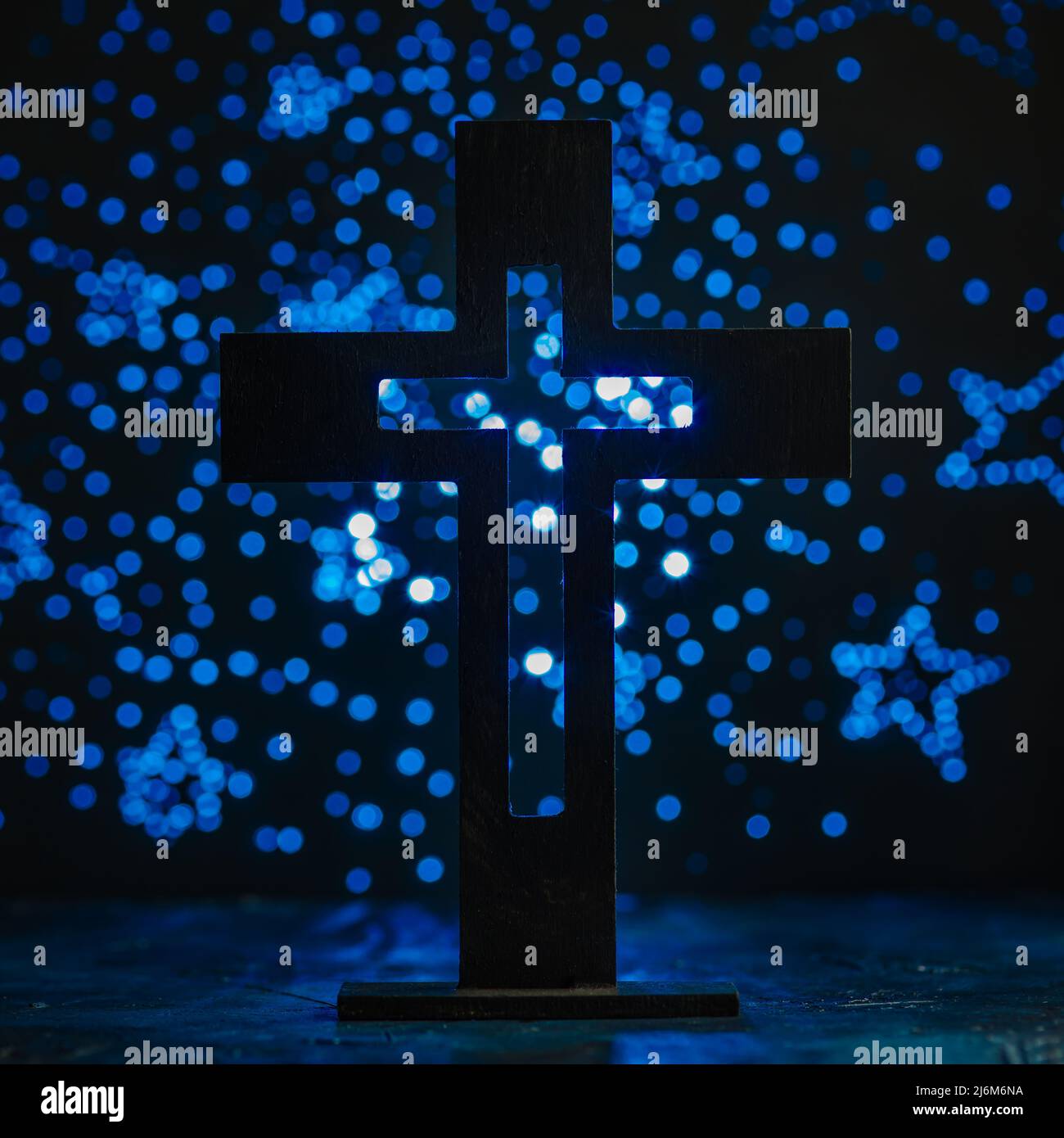 Large Catholic cross on a blue background with twinkling stars ...