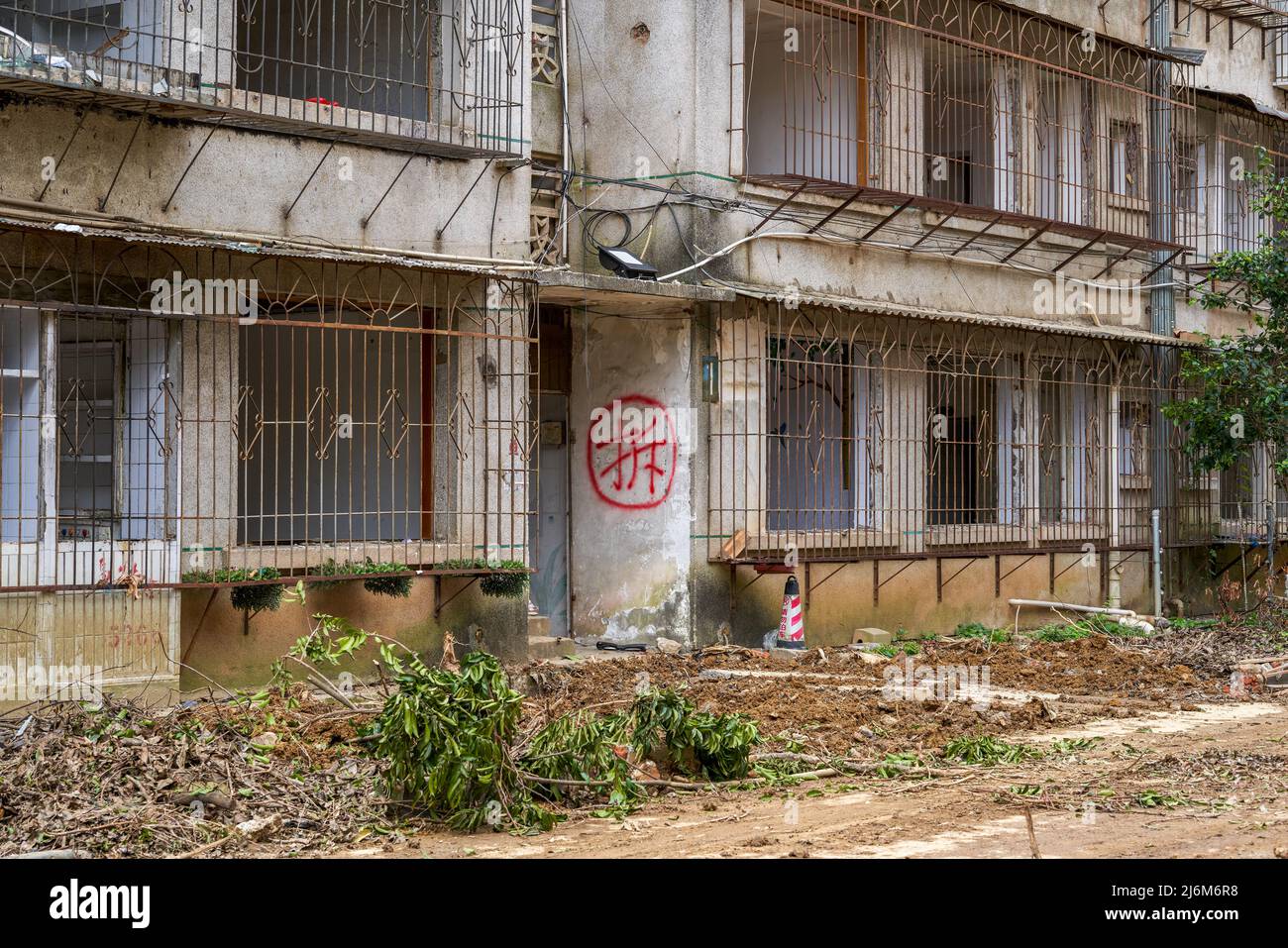 Demolition words are written on the abandoned old residential buildings ...
