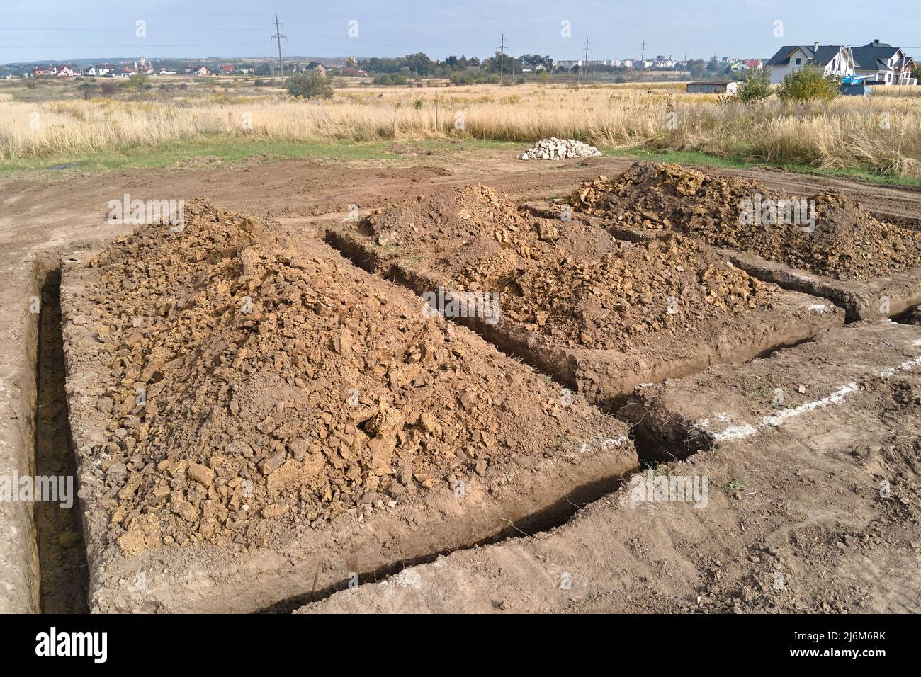 Dug out trench for building works of new house concrete foundation on ...