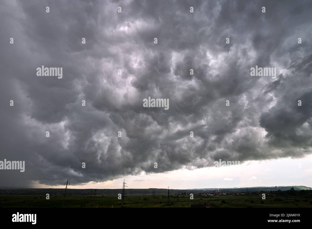 Landscape of dark ominous clouds forming on stormy sky during heavy ...
