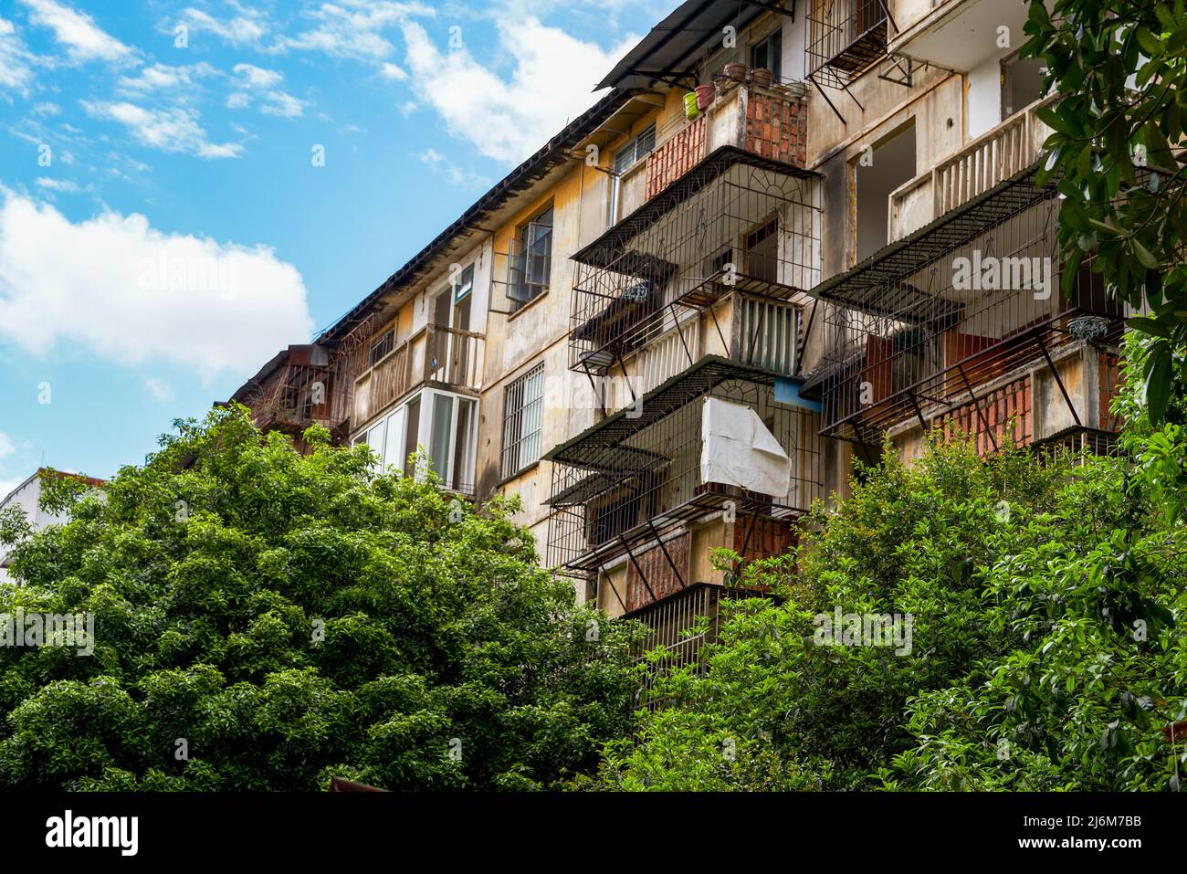 Close-up of residential buildings in an abandoned old residential area ...